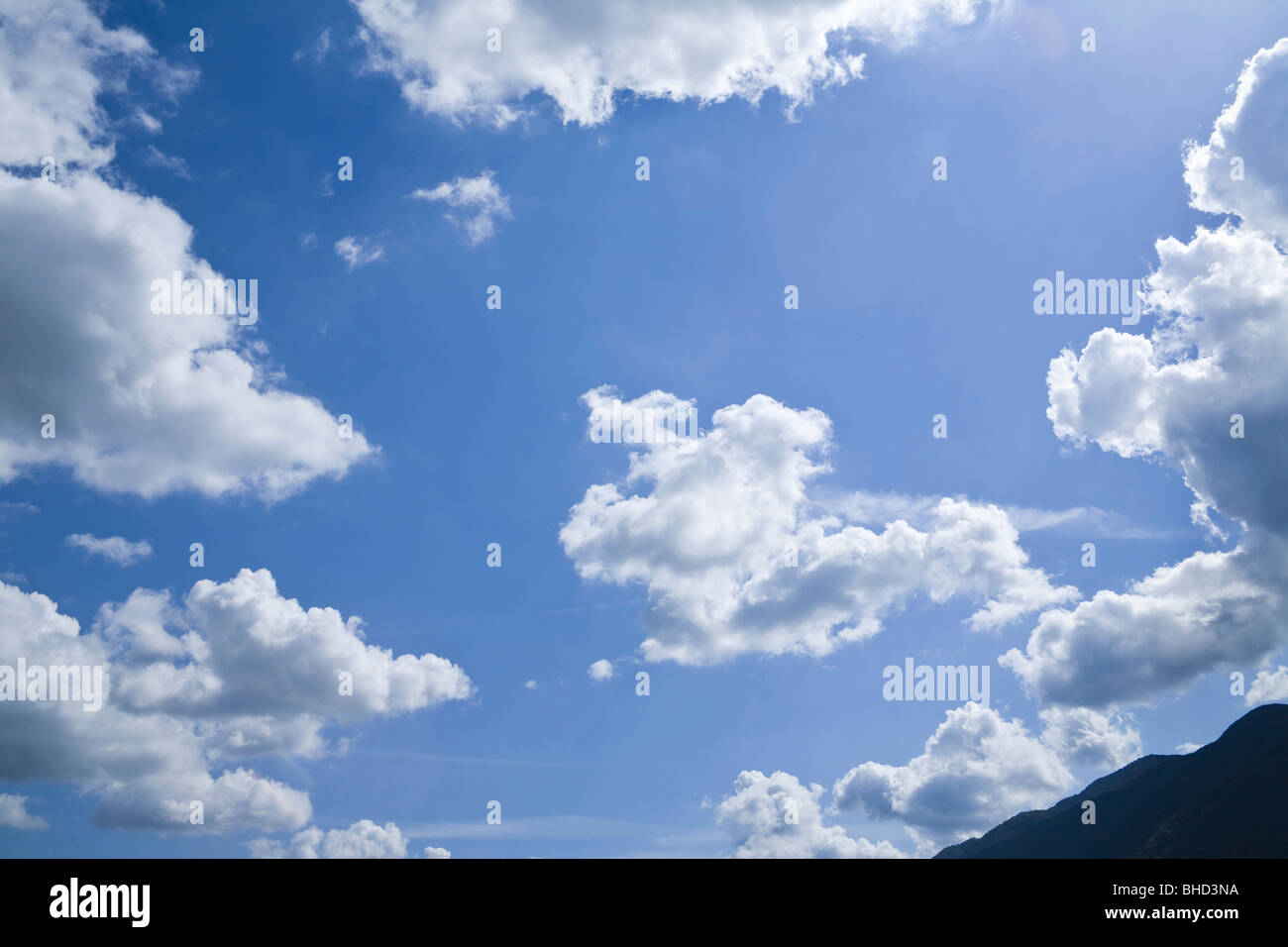 Cloud sin blue sky Stock Photo - Alamy