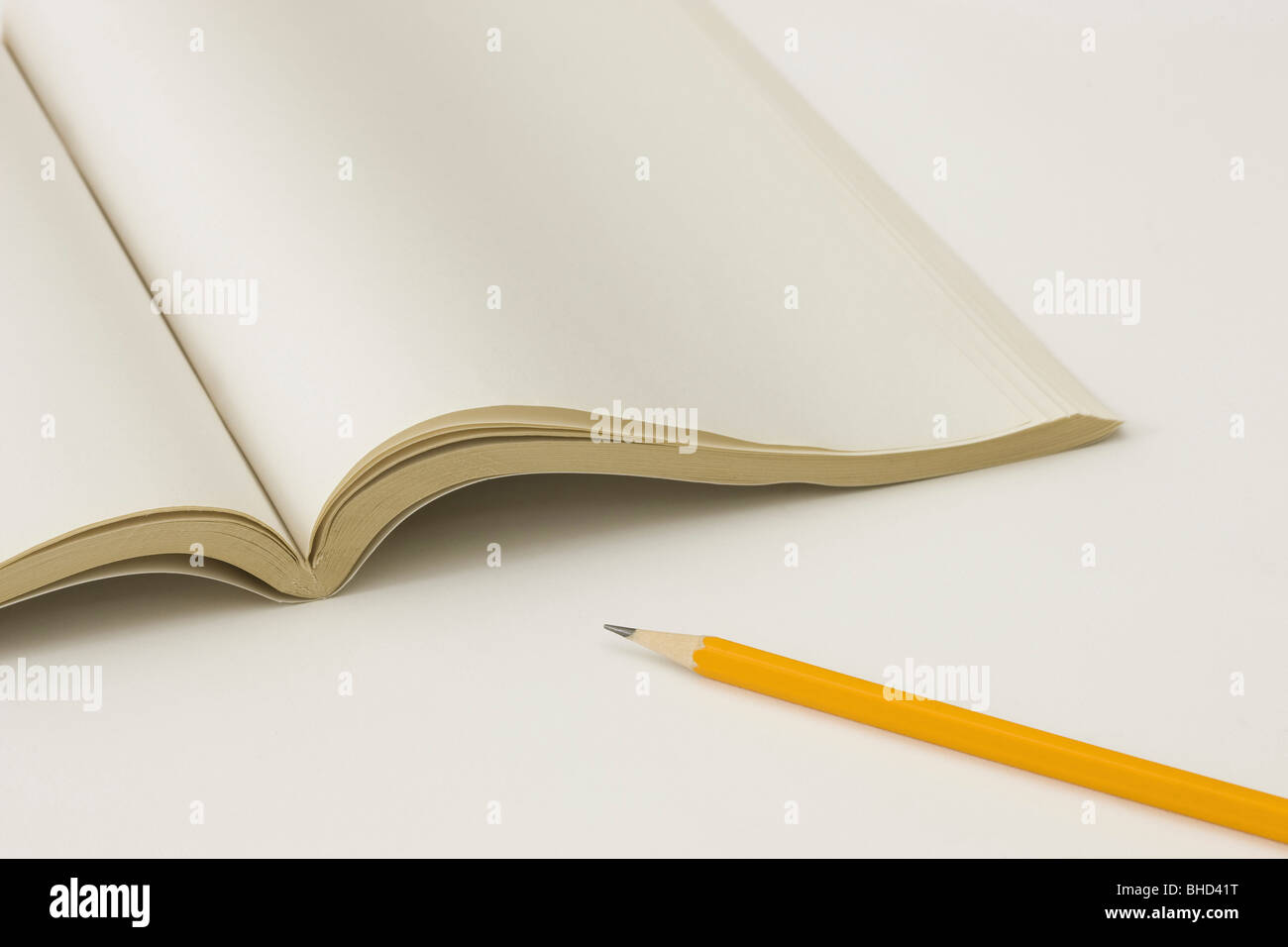 Blank open book and pencil Stock Photo - Alamy