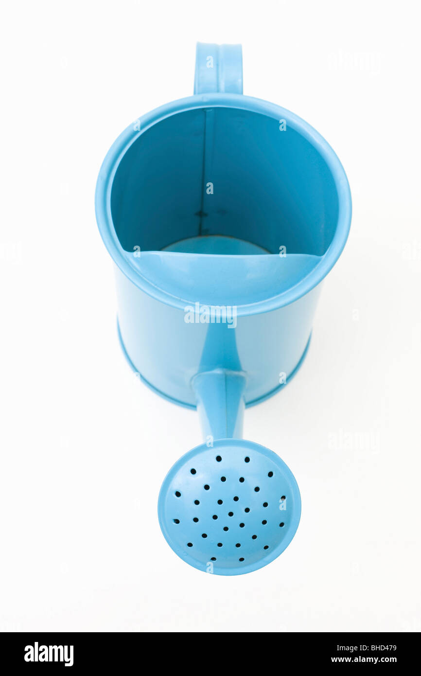 Blue watering can Stock Photo - Alamy