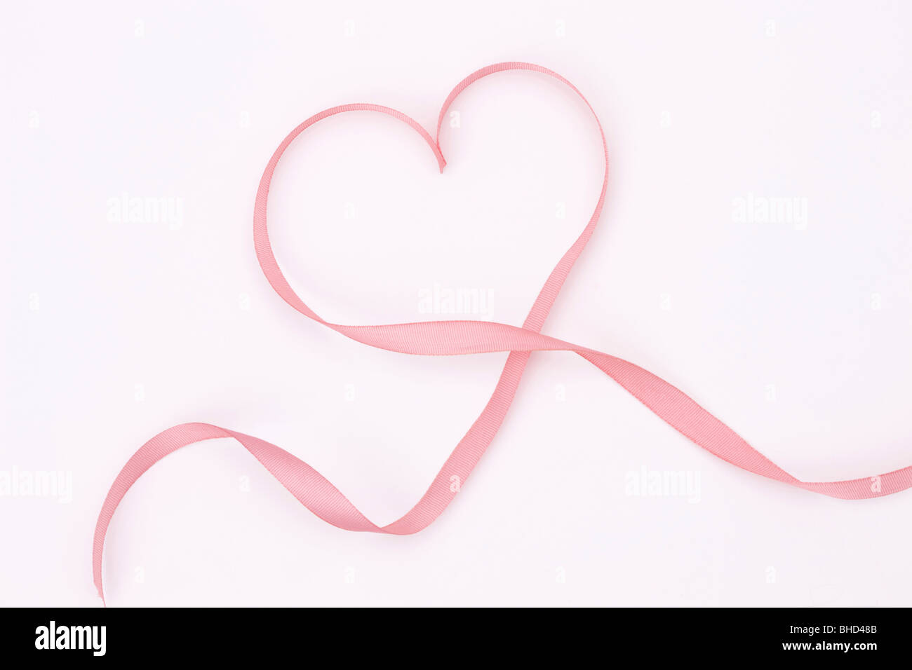 Ribbon making heart shape Stock Photo - Alamy