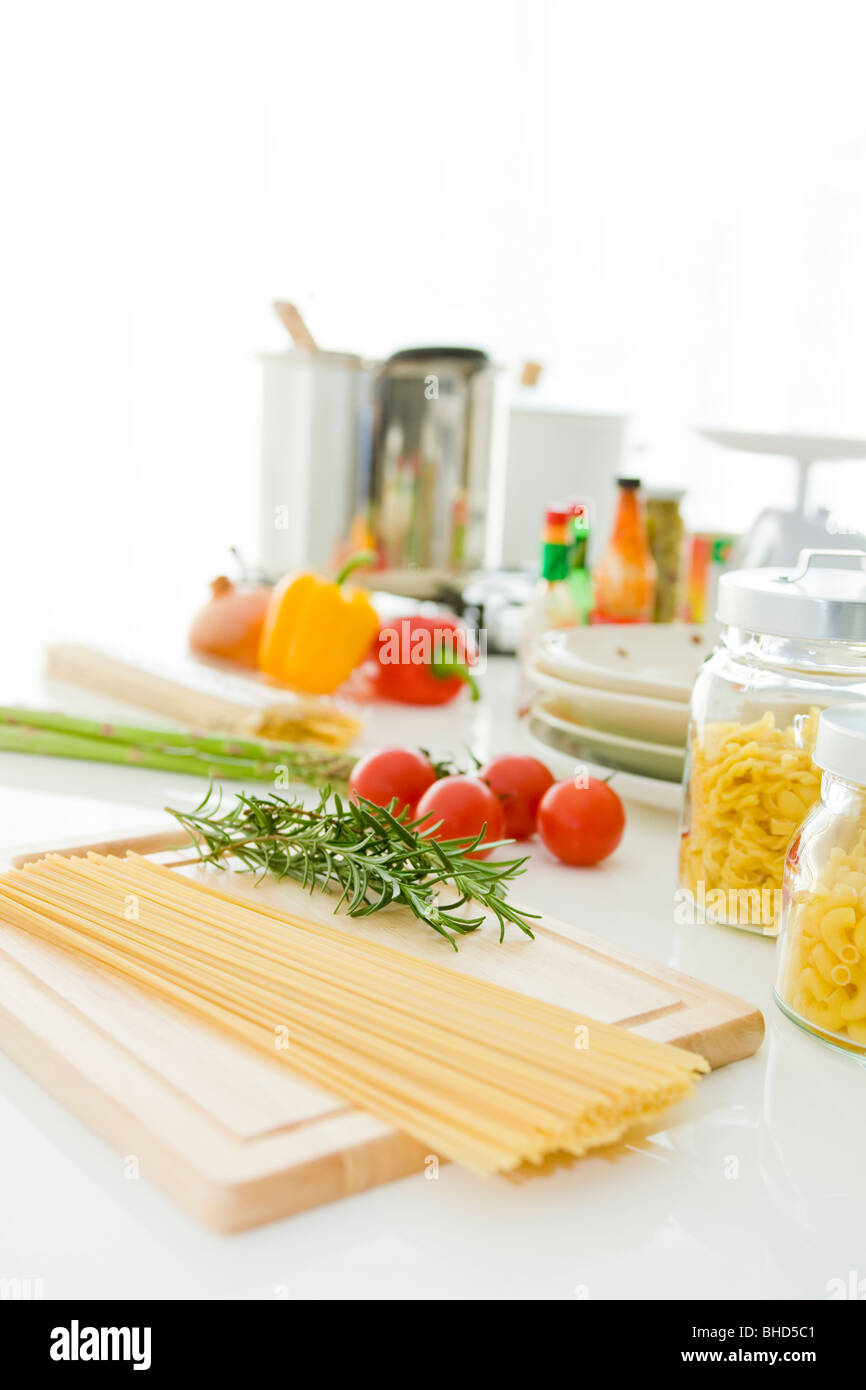 Pasta and fresh ingredients ready to be cooked Stock Photo - Alamy