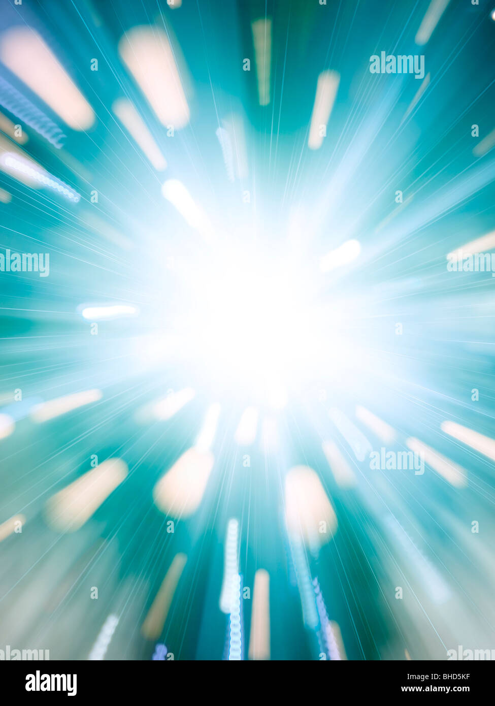 Bright light beams on green background Stock Photo - Alamy
