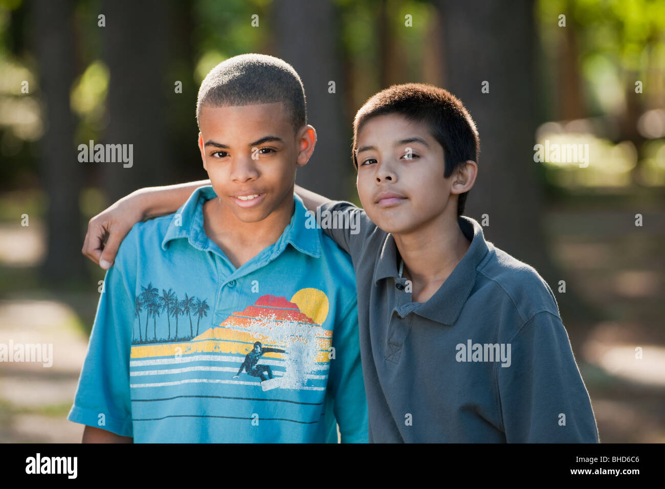 Friends standing together Stock Photo - Alamy