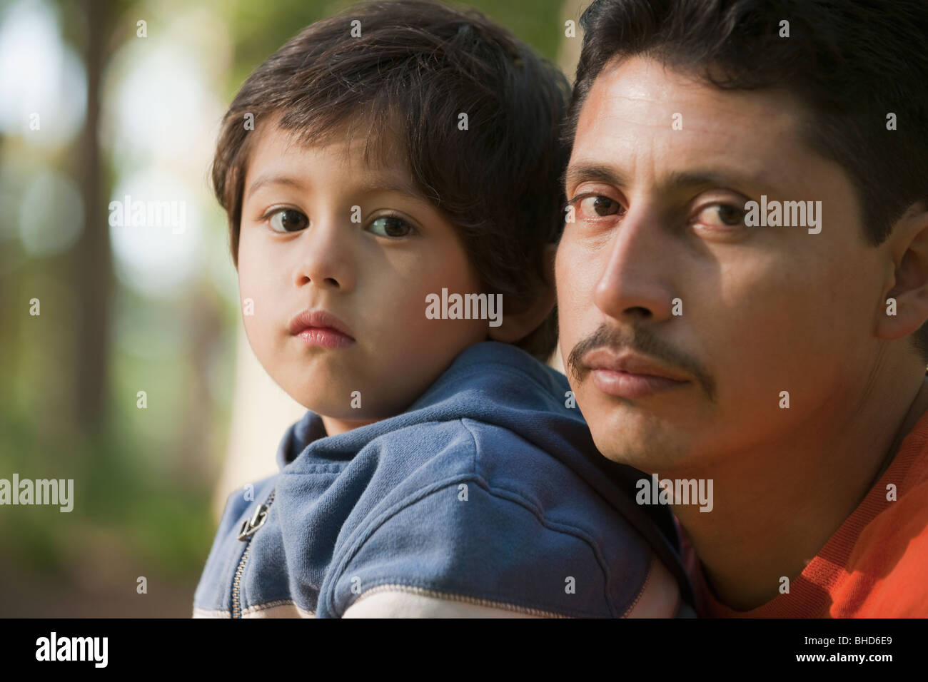 Hispanic father and son Stock Photo - Alamy