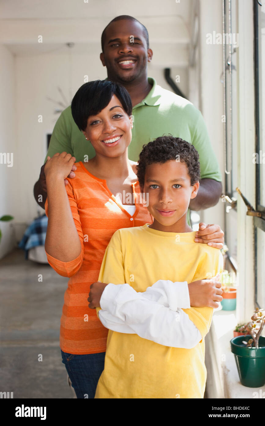 Family smiling together Stock Photo - Alamy