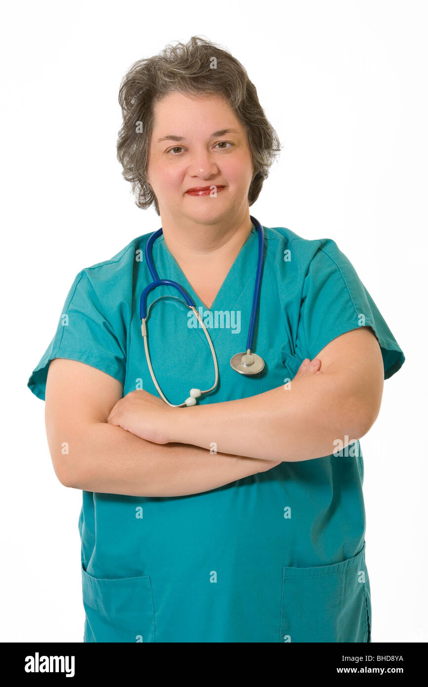 A female nurse portrait with a stethoscope and smiling and folding her ...