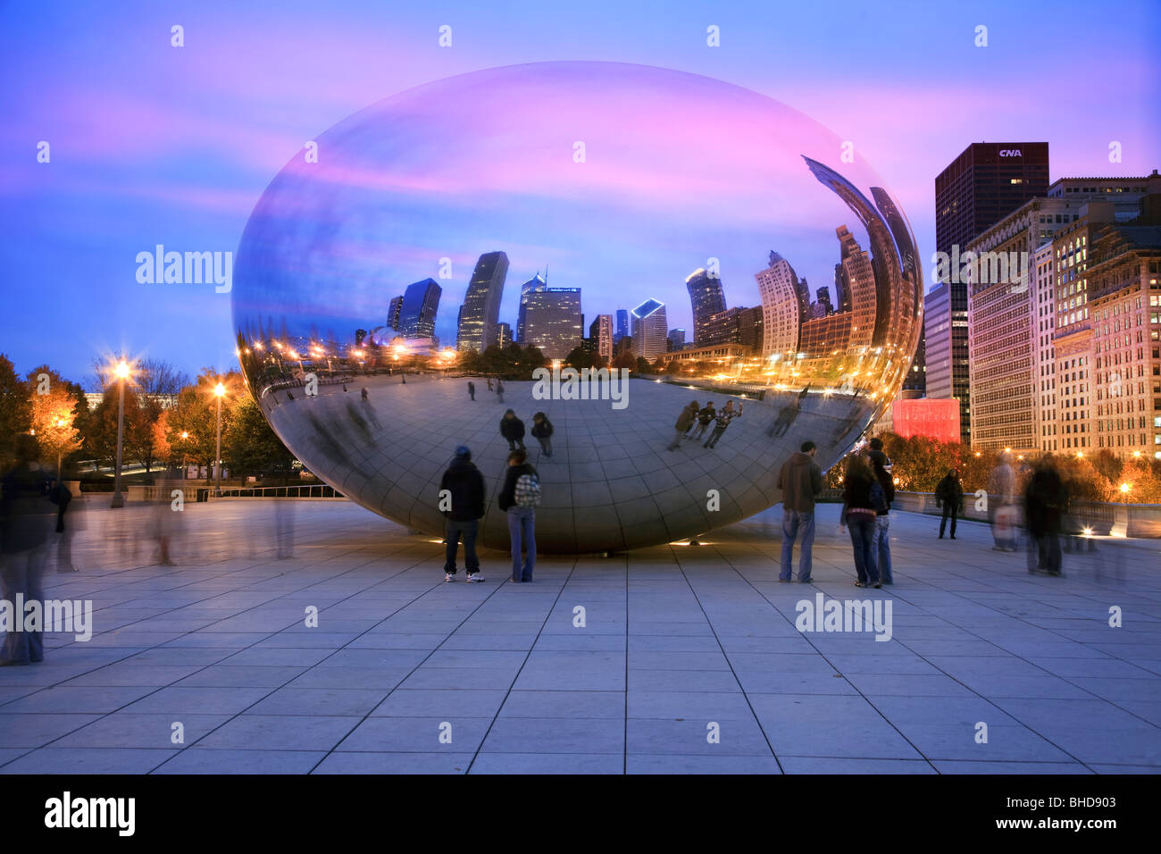 The Cloud Gate sculpture also known as "the bean" in Millennium park ...