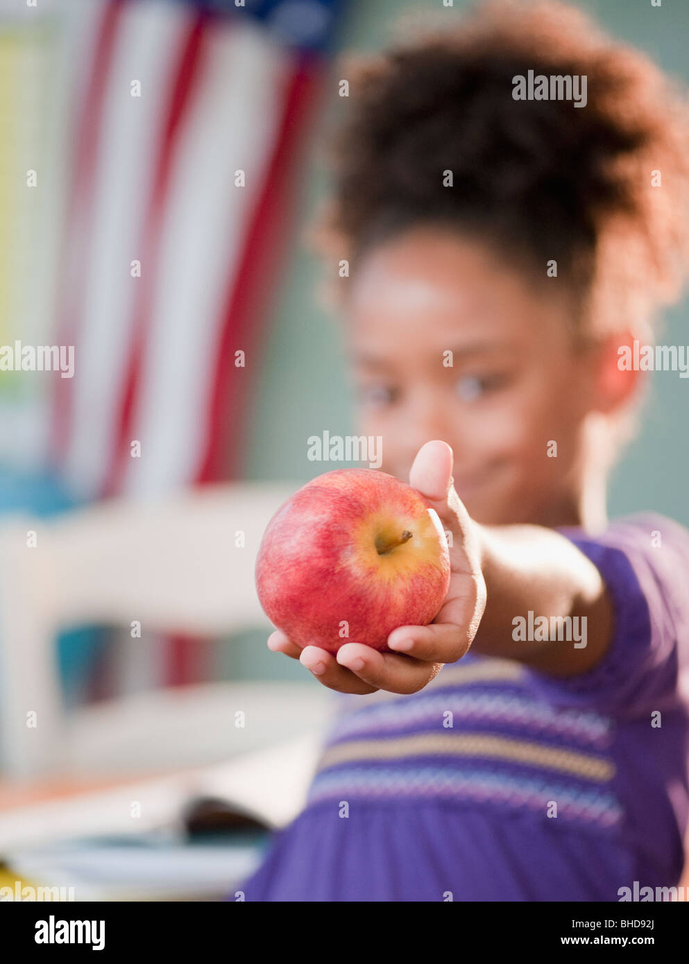 Girl giving an apple hi-res stock photography and images - Alamy