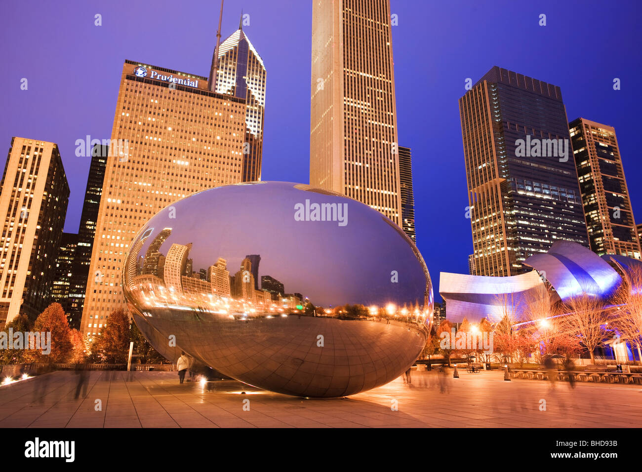 The Cloud Gate sculpture also known as "the bean" in Millennium park ...