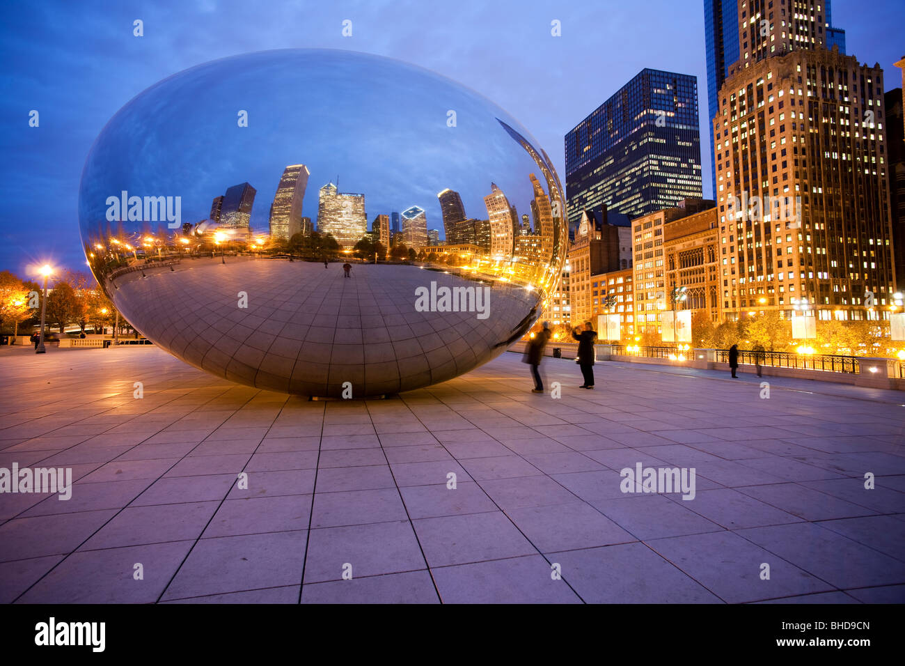 The Cloud Gate sculpture also known as "the bean" in Millennium park ...