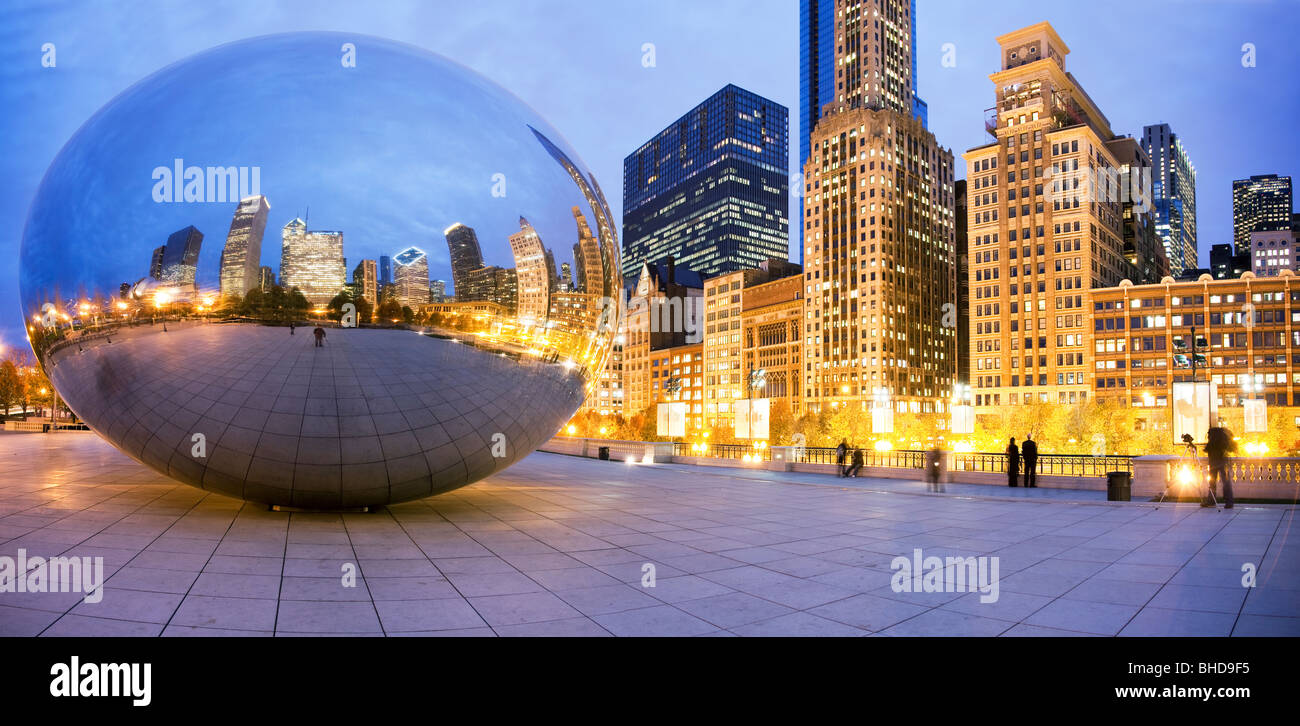 The Cloud Gate sculpture also known as "the bean" in Millennium park ...