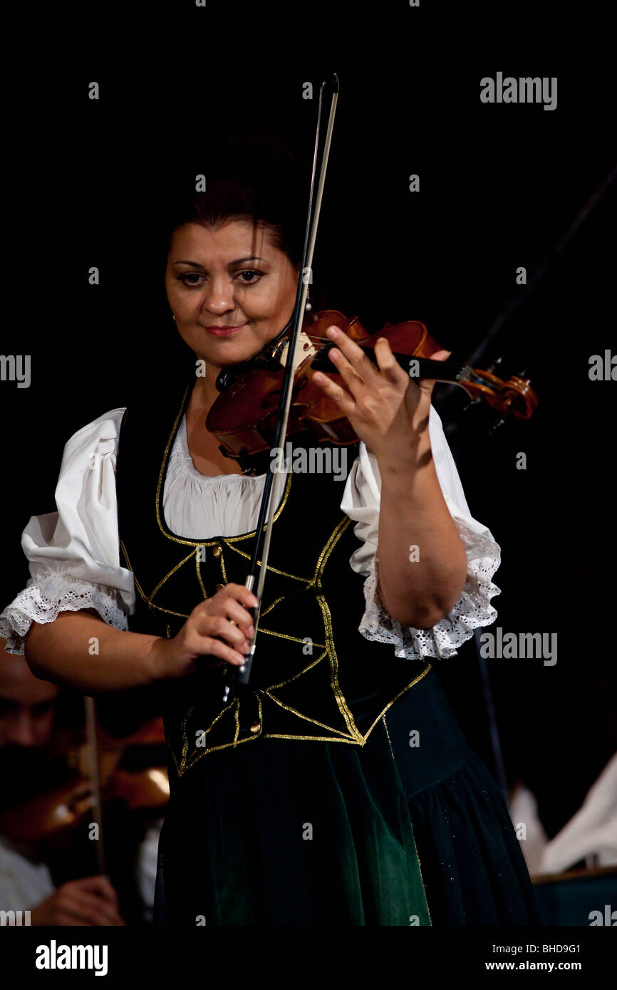 Lady playing a violin hi-res stock photography and images - Alamy