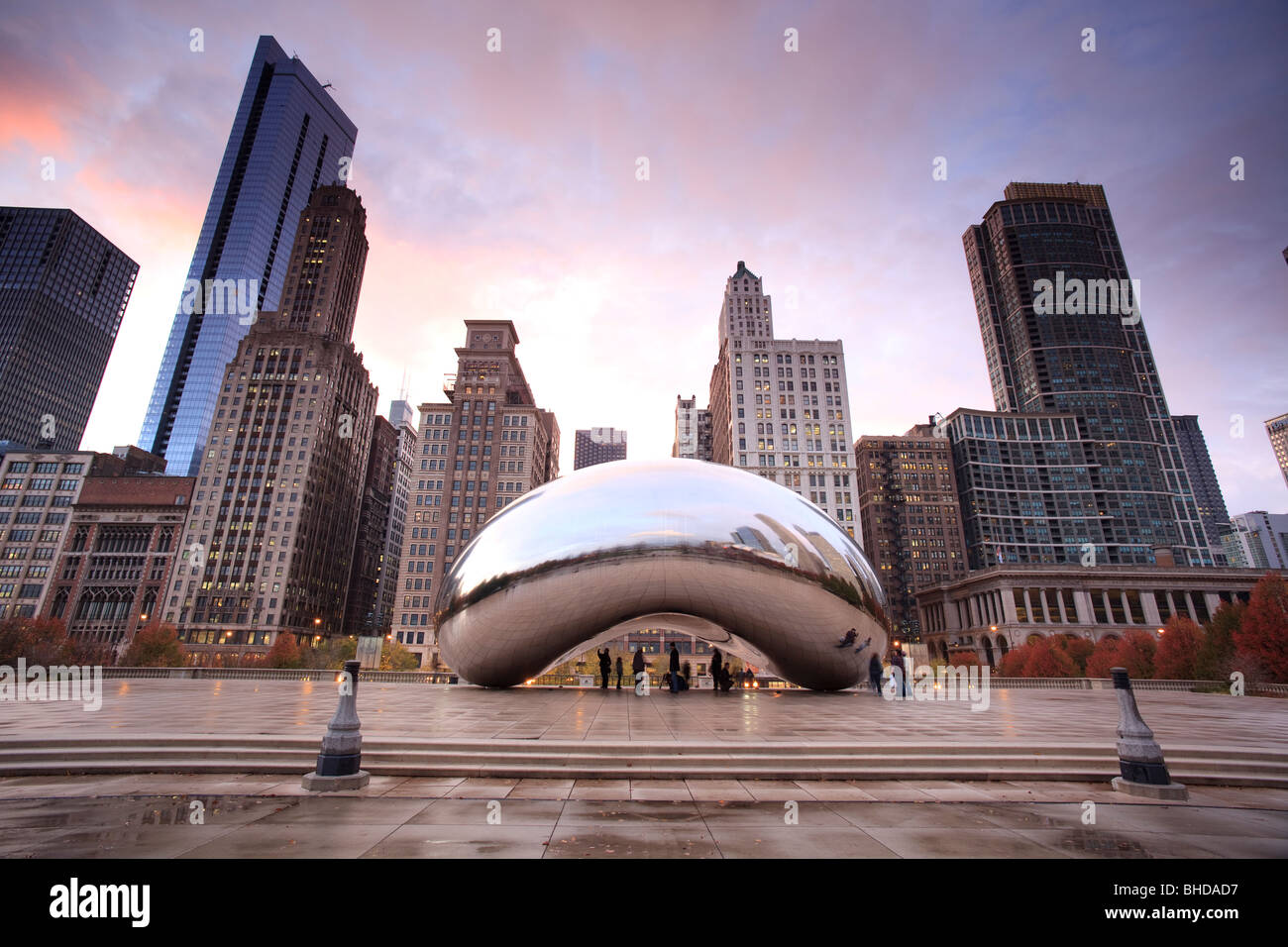 The Cloud Gate sculpture also known as "the bean" in Millennium park ...