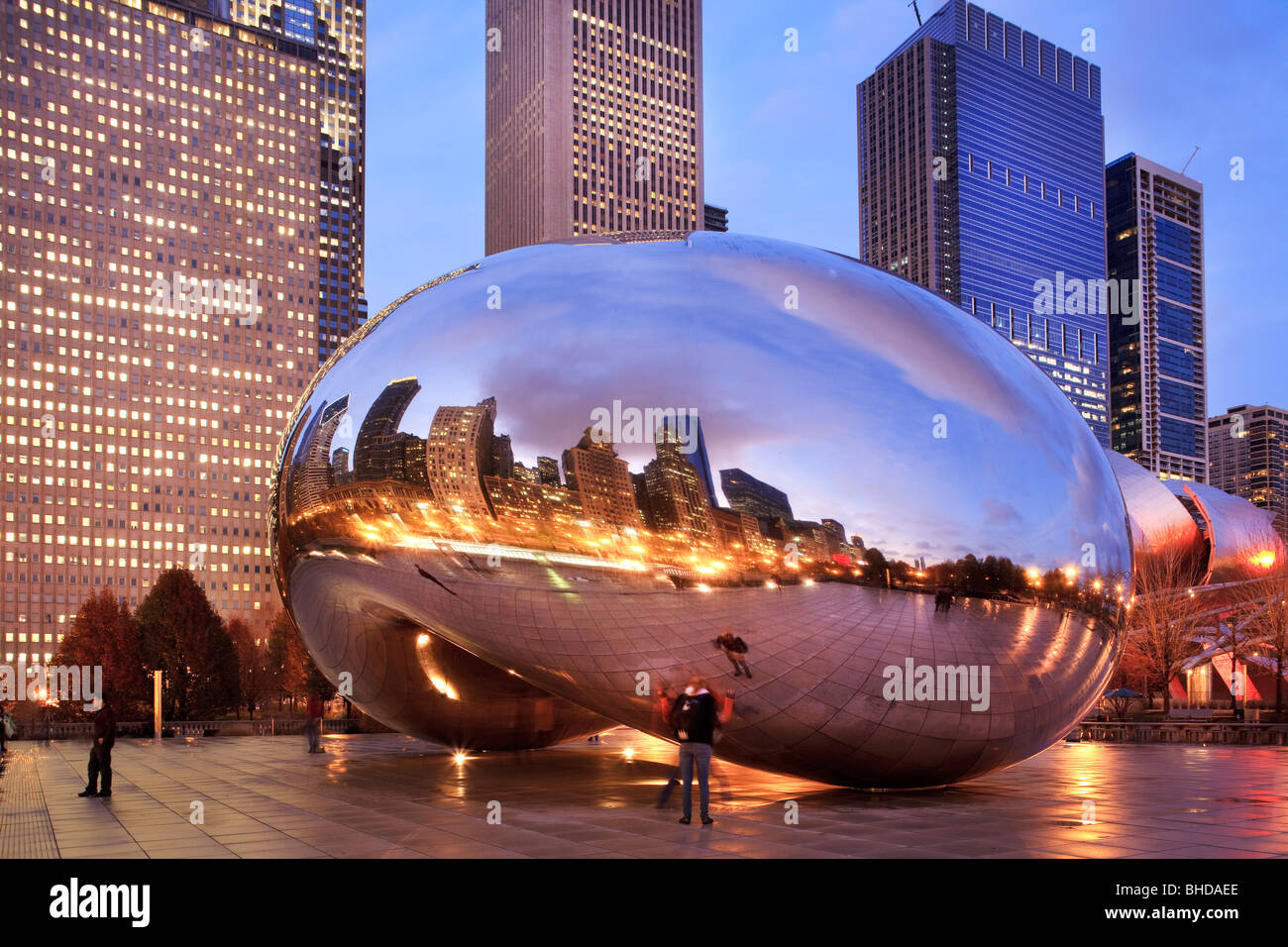 The Cloud Gate sculpture also known as "the bean" in Millennium park ...