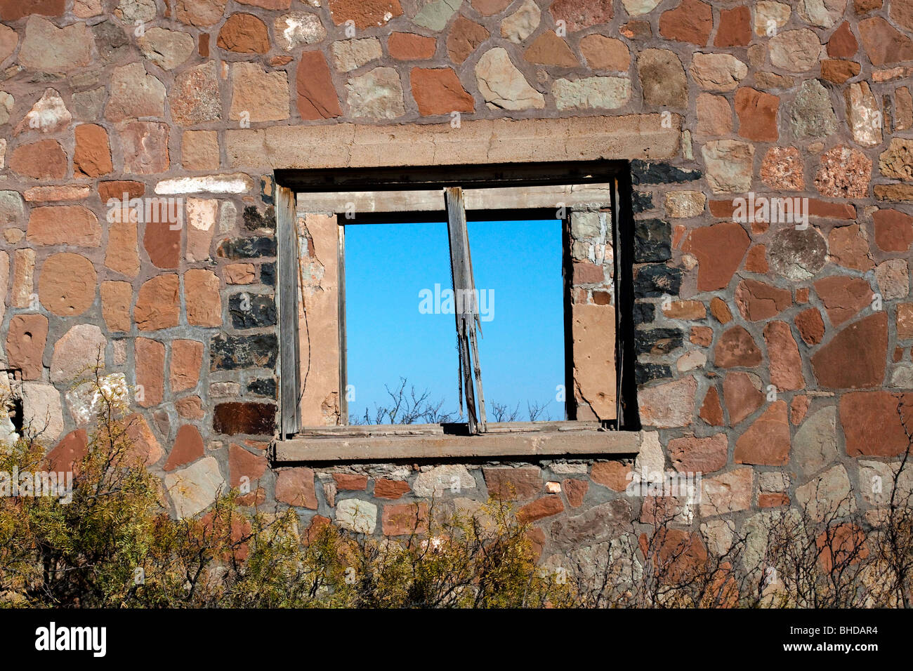 Window in rock wall Stock Photo - Alamy