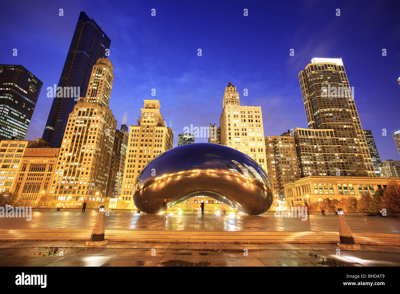 The Cloud Gate sculpture also known as "the bean" in Millennium park ...
