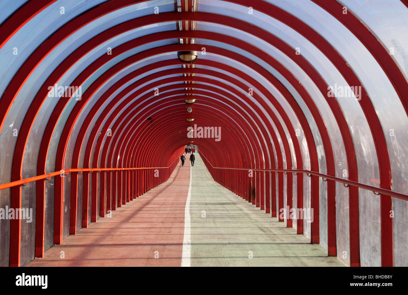 A view along an enclosed footbridge in Glasgow, Scotland Stock Photo ...