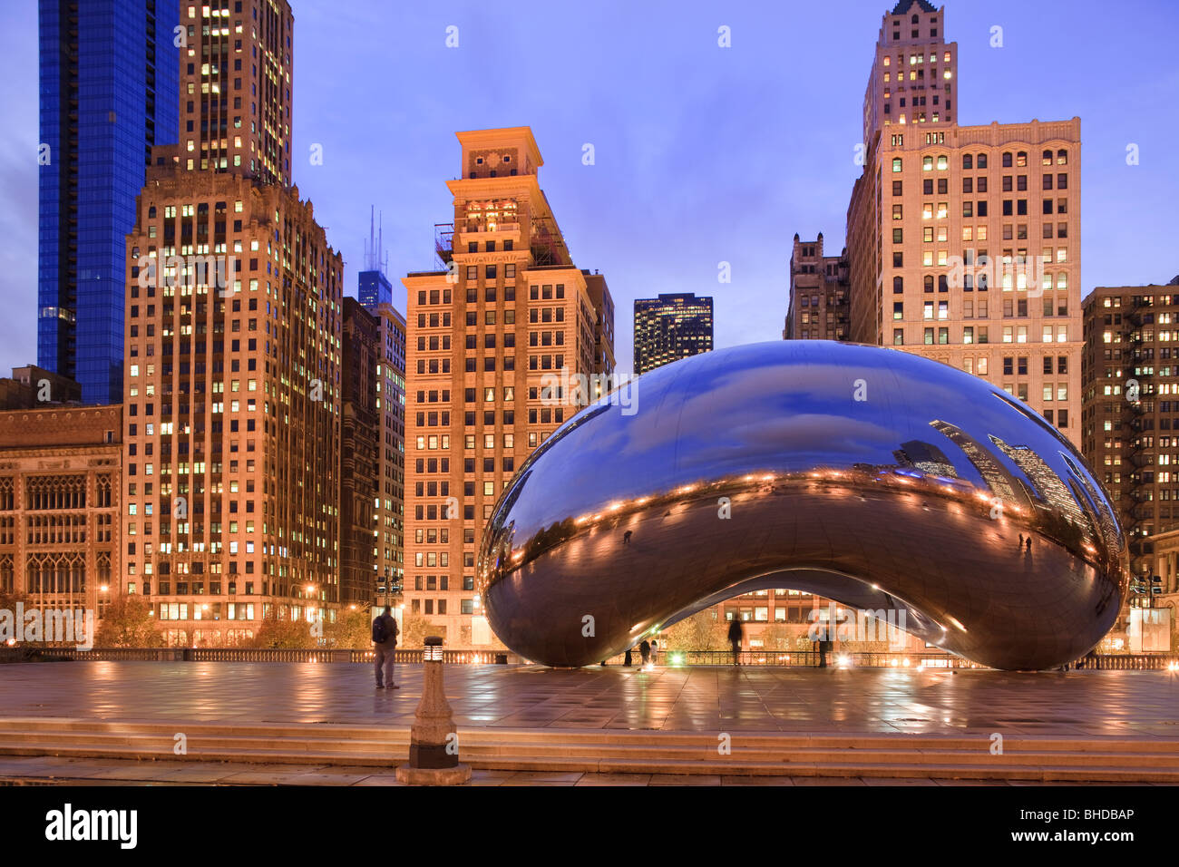 The Cloud Gate sculpture also known as "the bean" in Millennium park ...