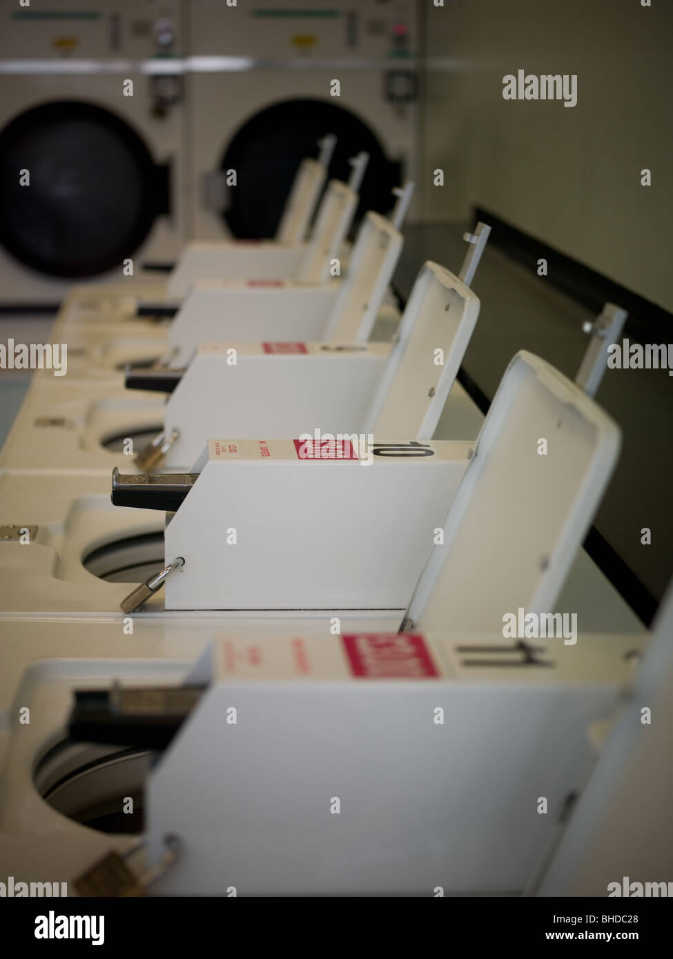 launderette washing machines Stock Photo - Alamy