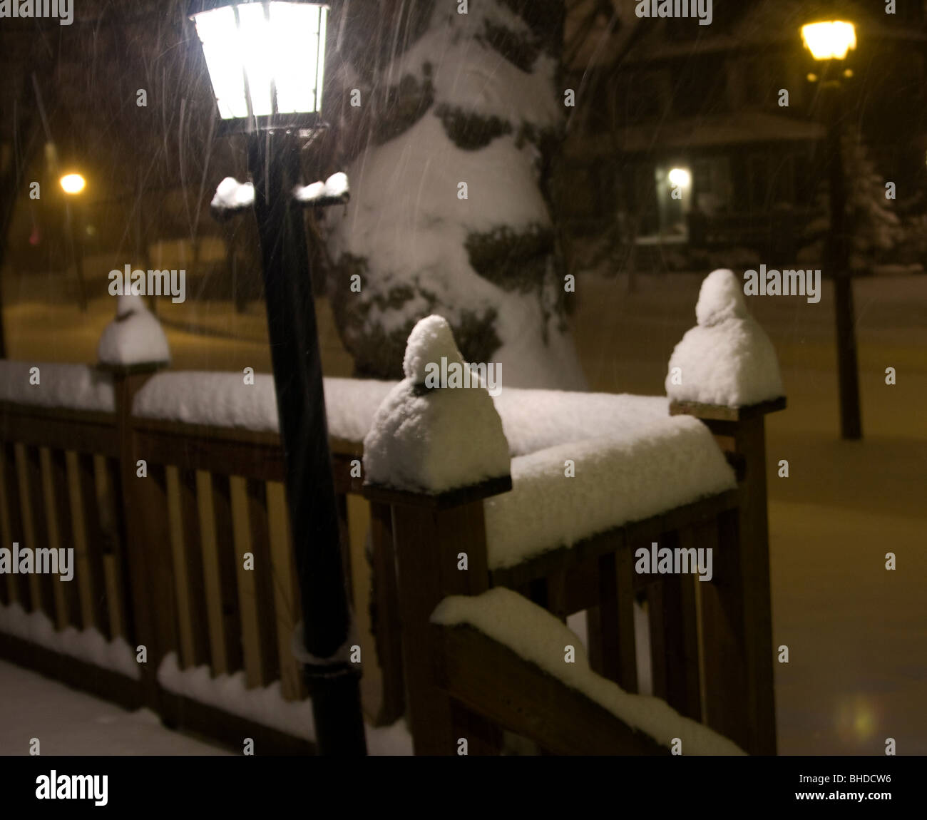 A front porch quickly accumulates snow during a winter storm Stock ...