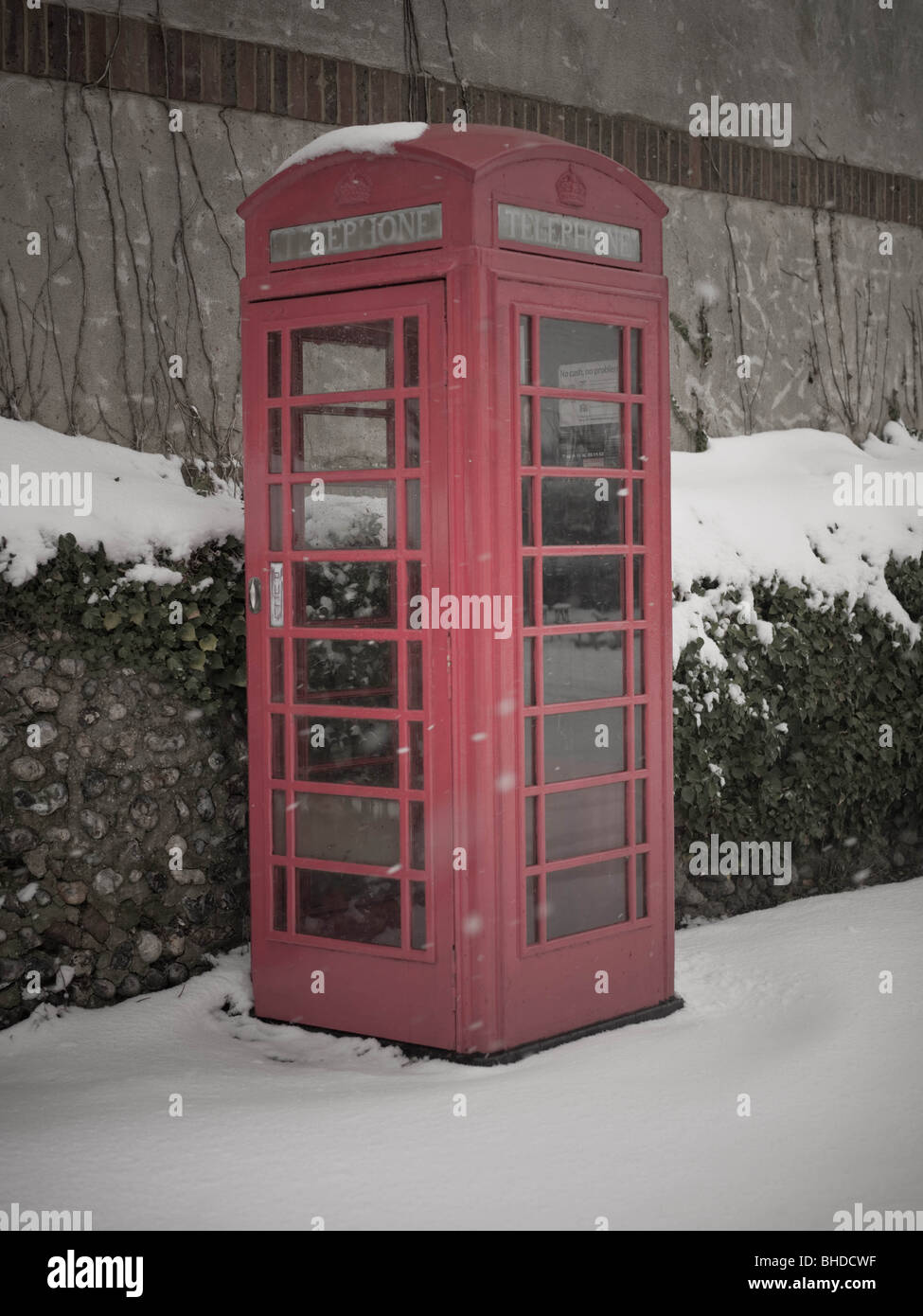 Red telephone box in the snow Stock Photo - Alamy