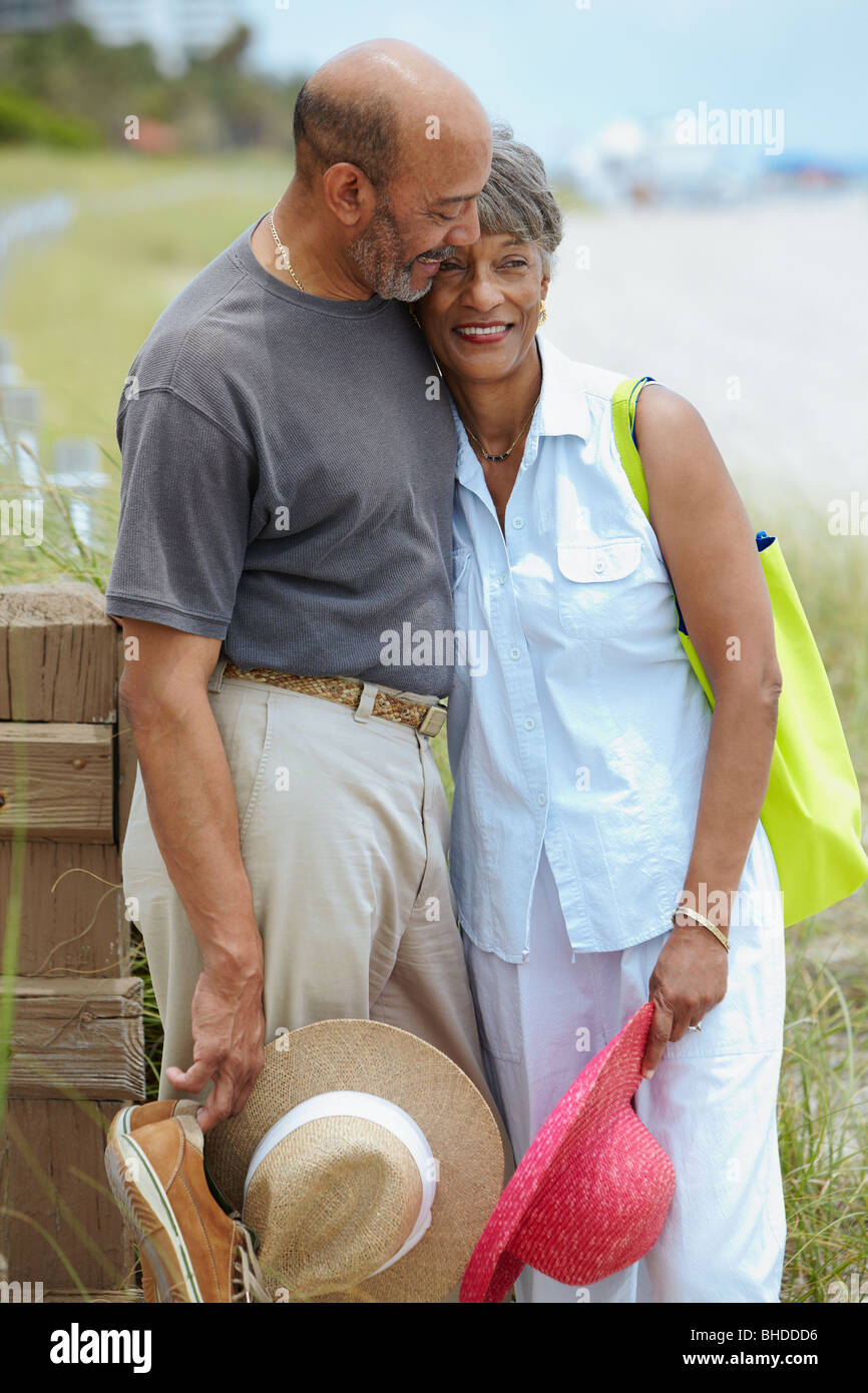 African couple hugging Stock Photo - Alamy