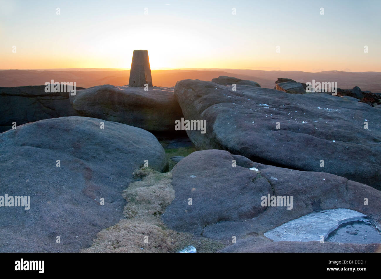 A winter sunset from Stanage Edge in the Peak District National Park ...