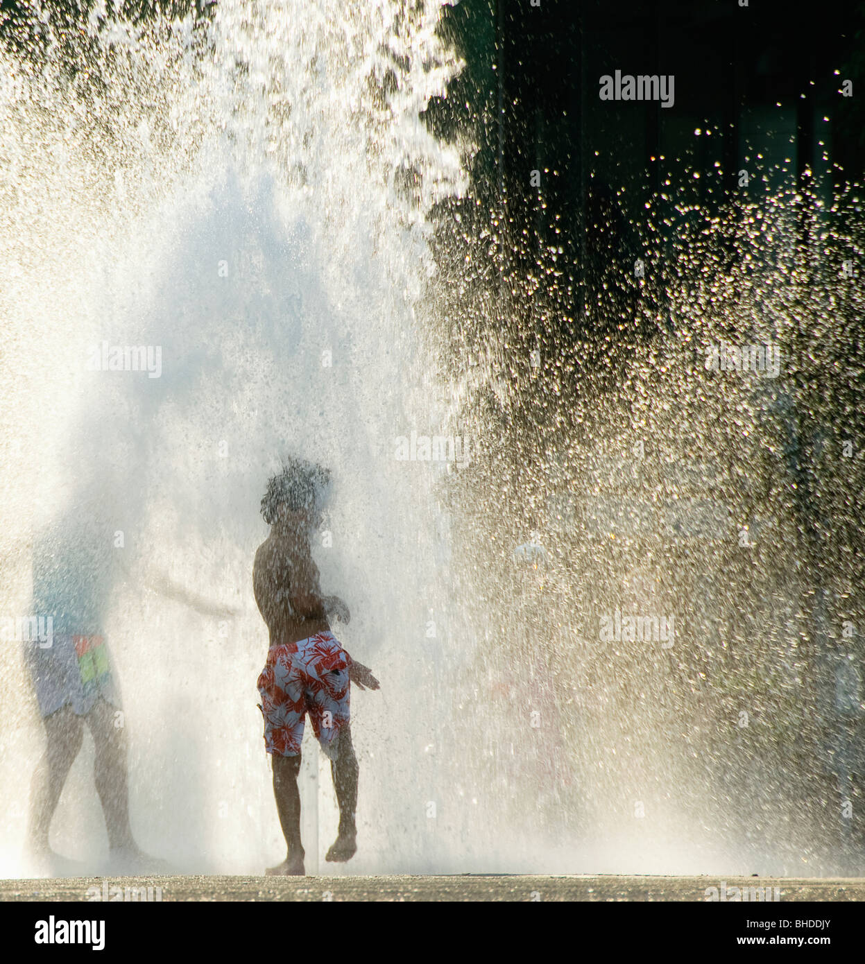Children jumping into water silhouette hi-res stock photography and ...