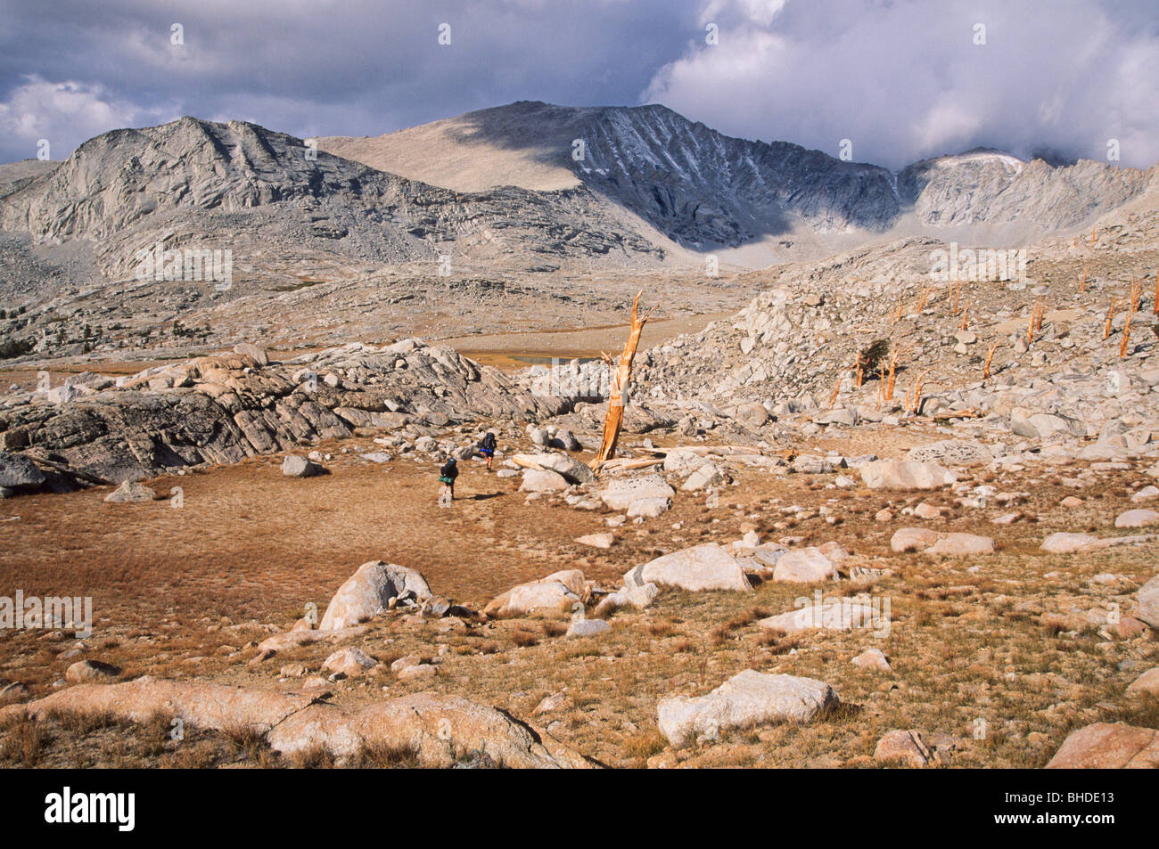 Two people backpacking Stock Photo - Alamy