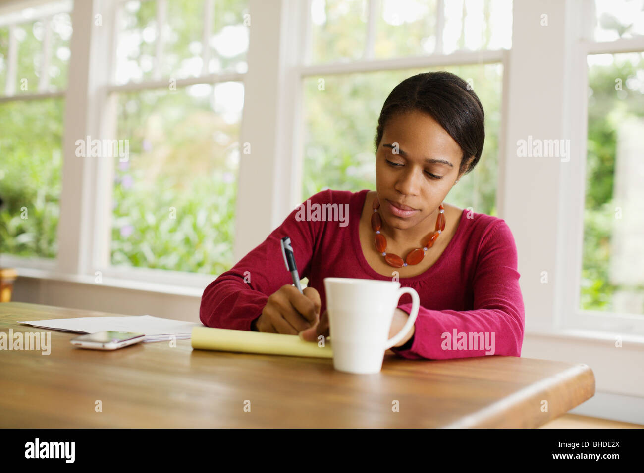 Working african woman hi-res stock photography and images - Alamy