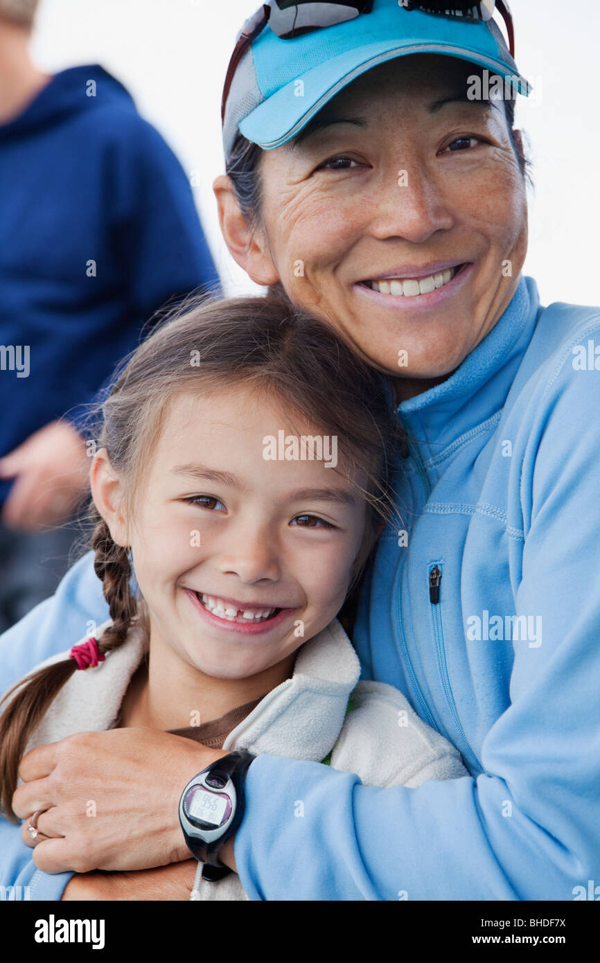Japanese mother and daughter hugging Stock Photo - Alamy