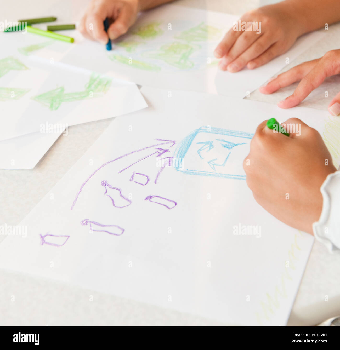 Girls drawing recycling pictures Stock Photo - Alamy