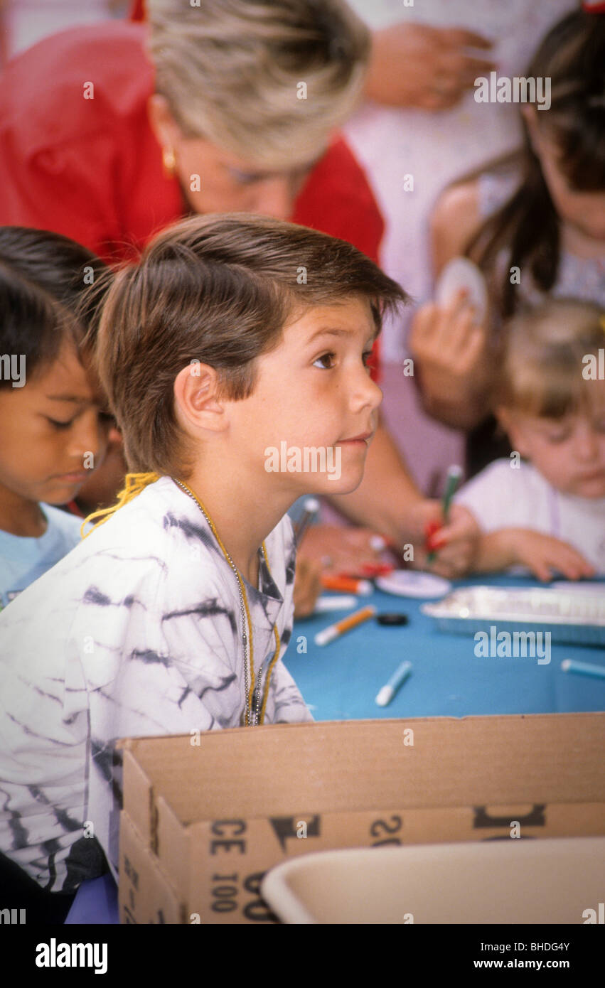 boy attentive attention work school project art fair fun create serious ...