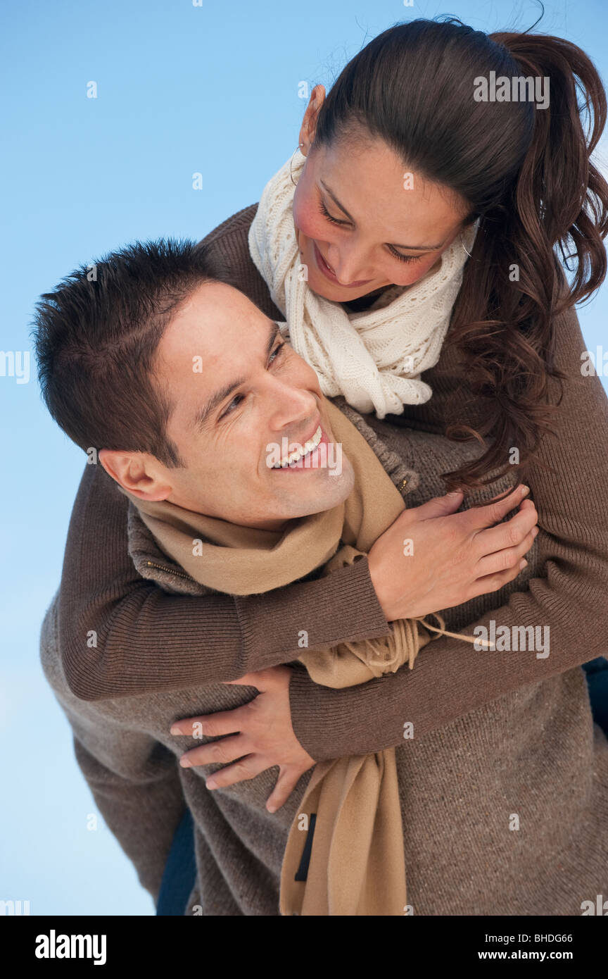 Hispanic couple hugging Stock Photo - Alamy