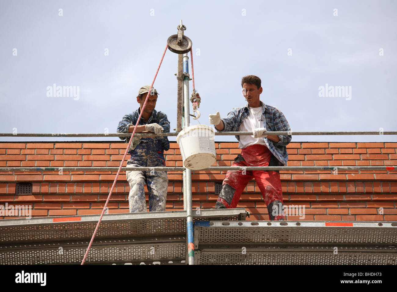 Workers at a construction site, Poznan, Poland Stock Photo - Alamy