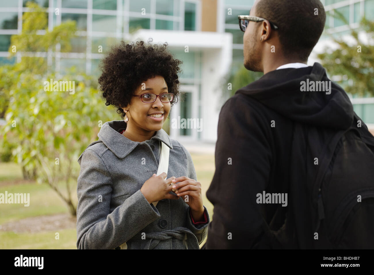 Couple talking outdoors Stock Photo - Alamy