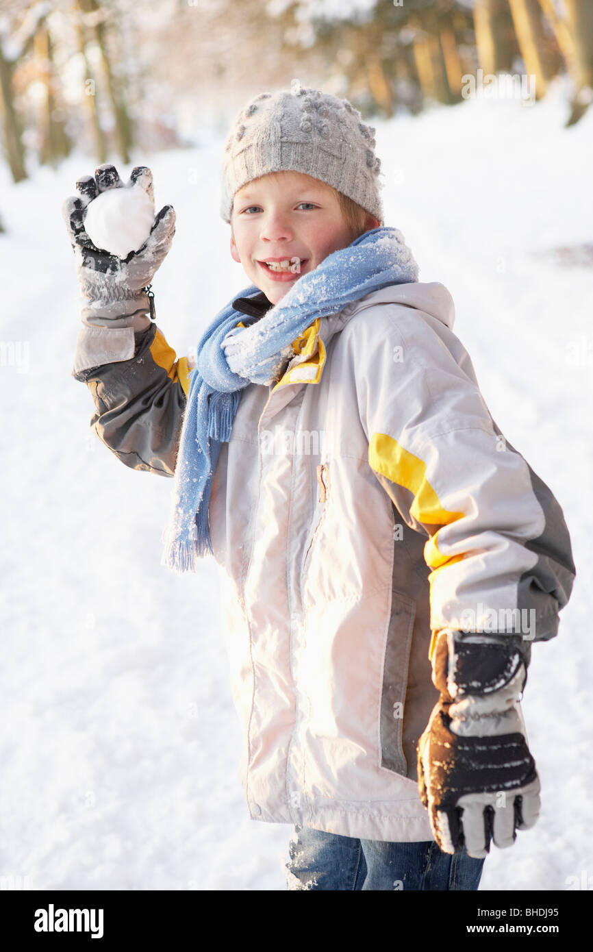 Child throwing snowball hi-res stock photography and images - Alamy