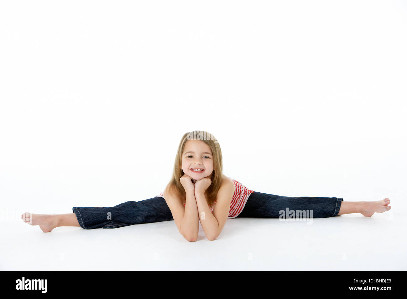 Young Girl In Gymnastic Pose Doing Splits Stock Photo - Alamy
