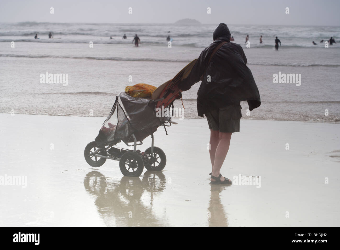 Wet and windy British beach in Summer, Polzeath, Cornwall, UK Stock ...