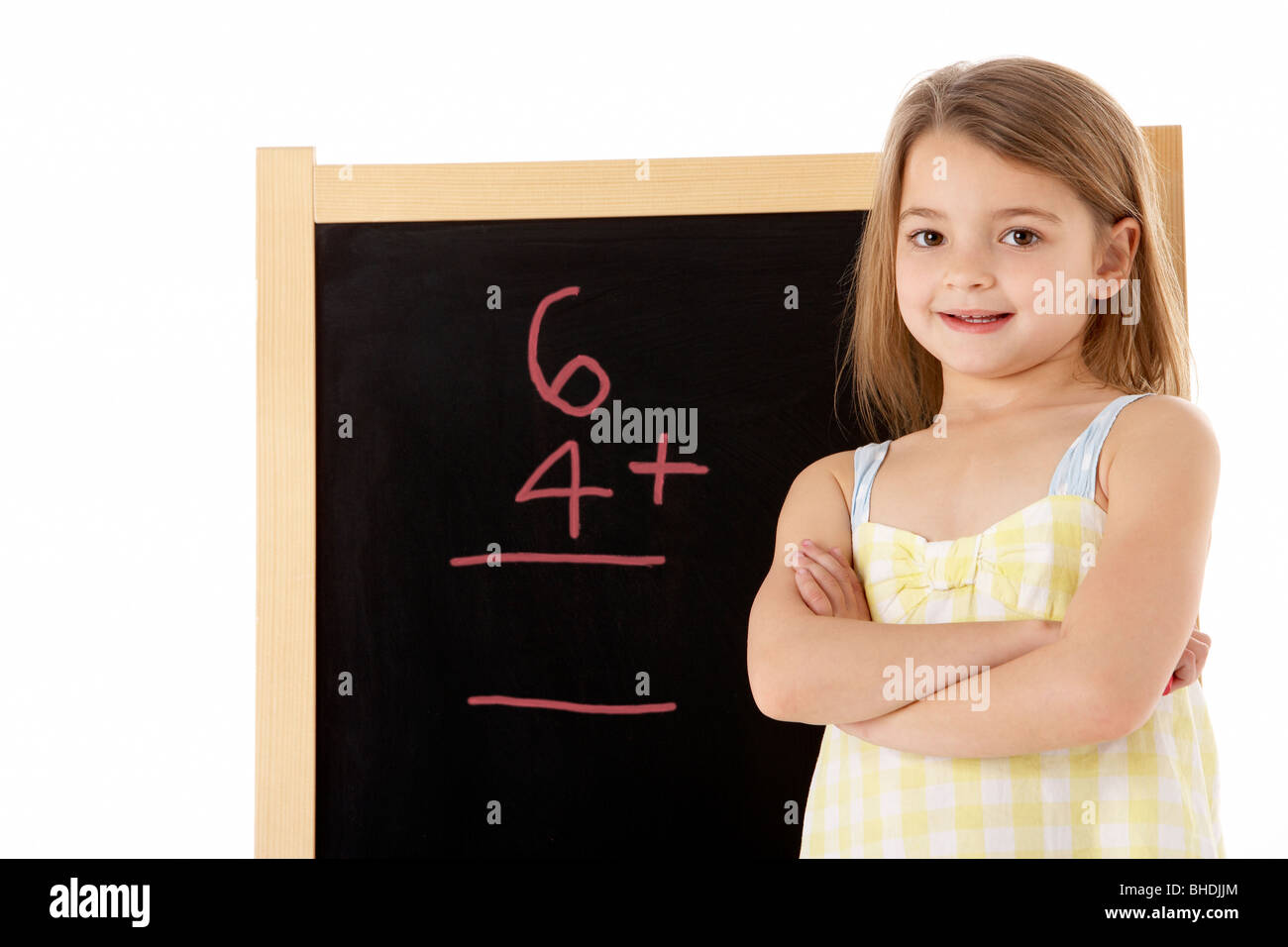 Young Girl Looking Thoughtful Next To Blackboard Stock Photo - Alamy