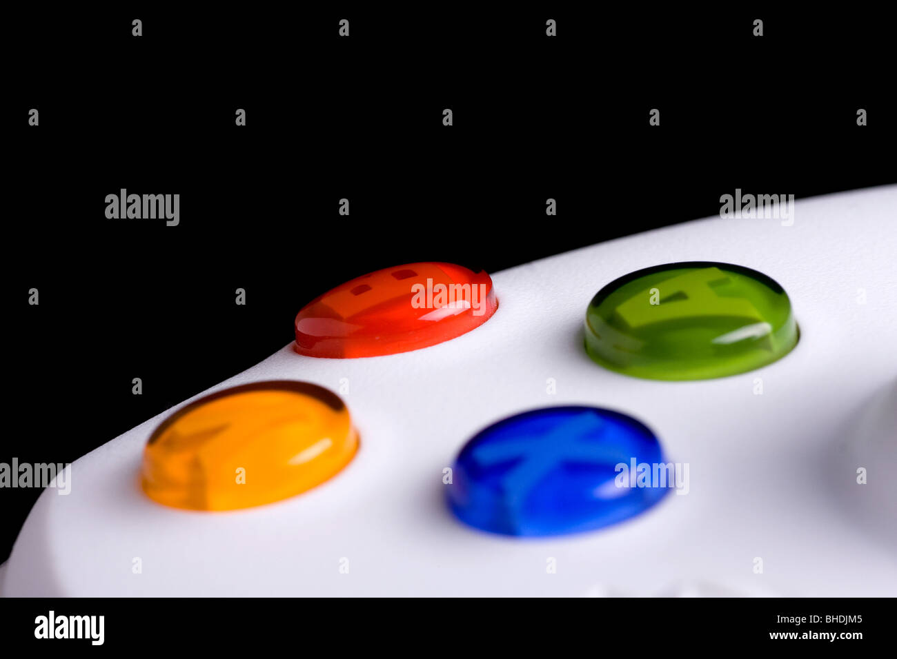 Xbox 360 controller main XYAB button on a black background Stock Photo ...