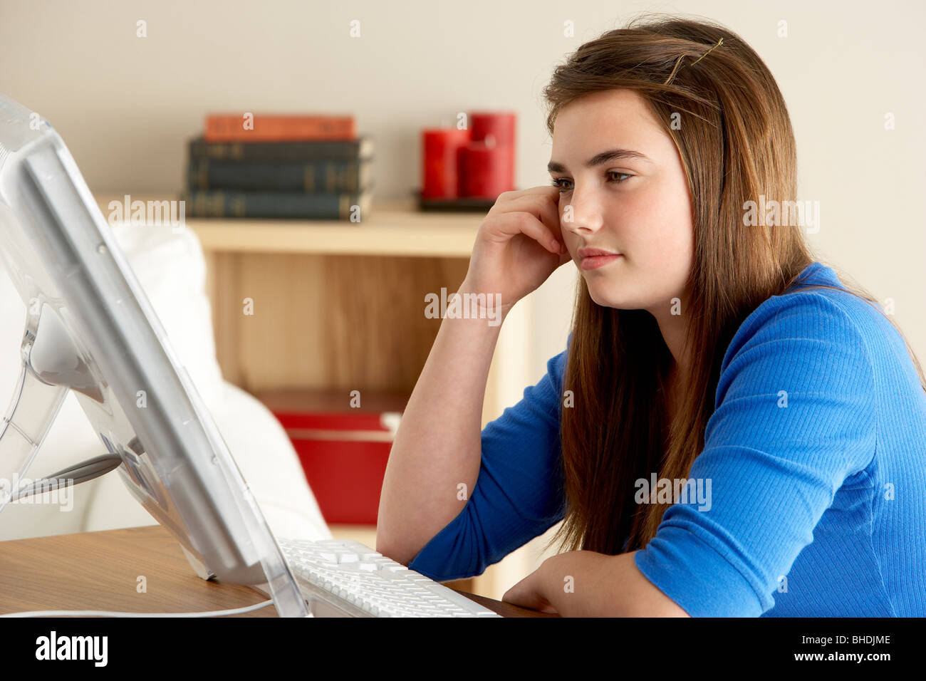 Teenage Girl Using Computer At Home Stock Photo - Alamy
