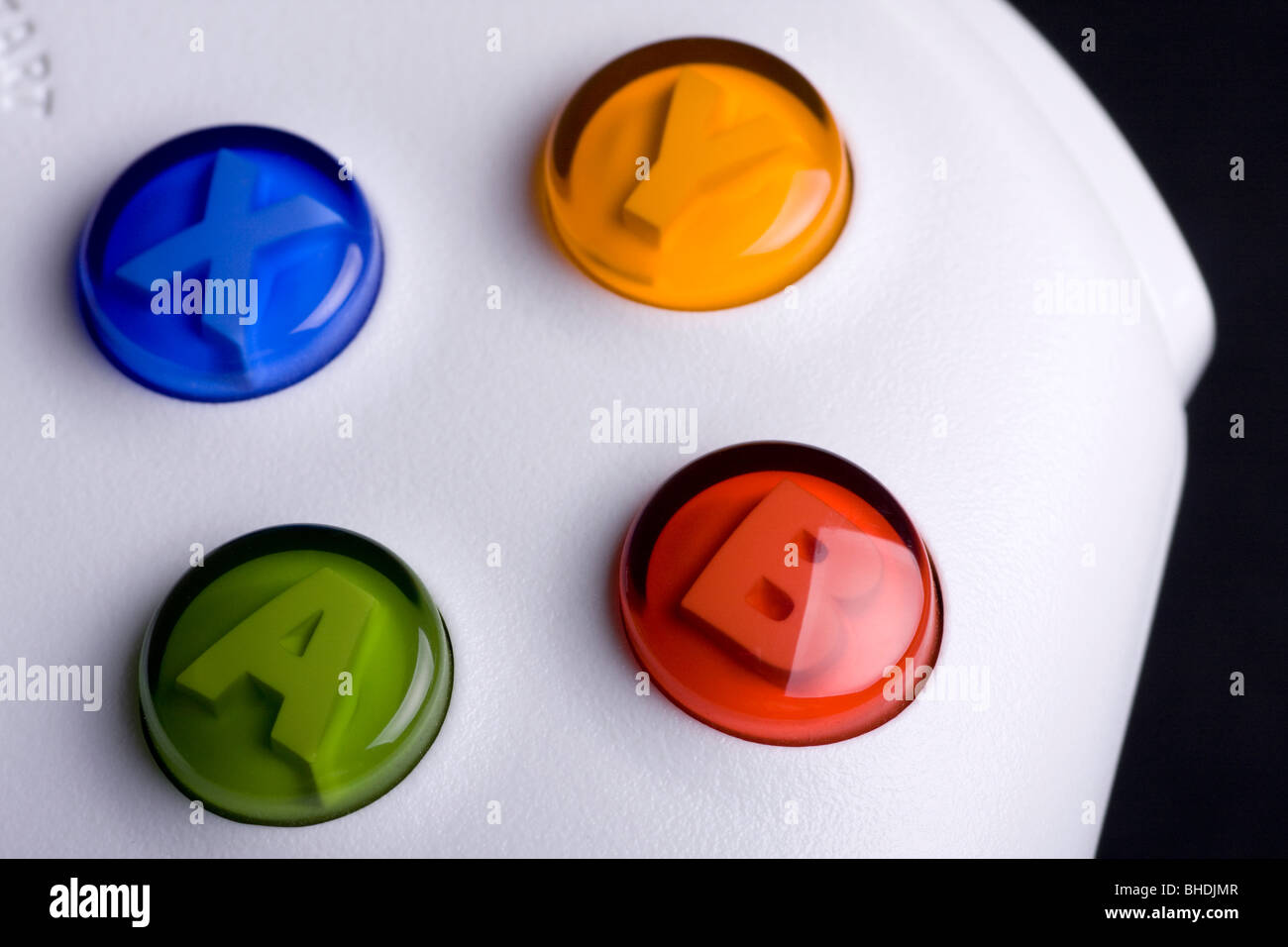 Xbox 360 controller main XYAB button on a black background Stock Photo ...