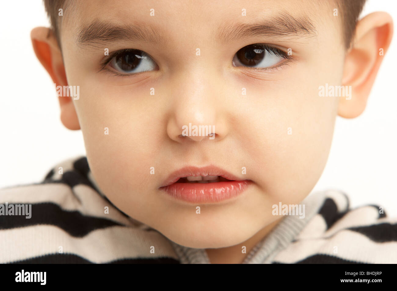 Studio Portrait Of Young Boy Stock Photo - Alamy