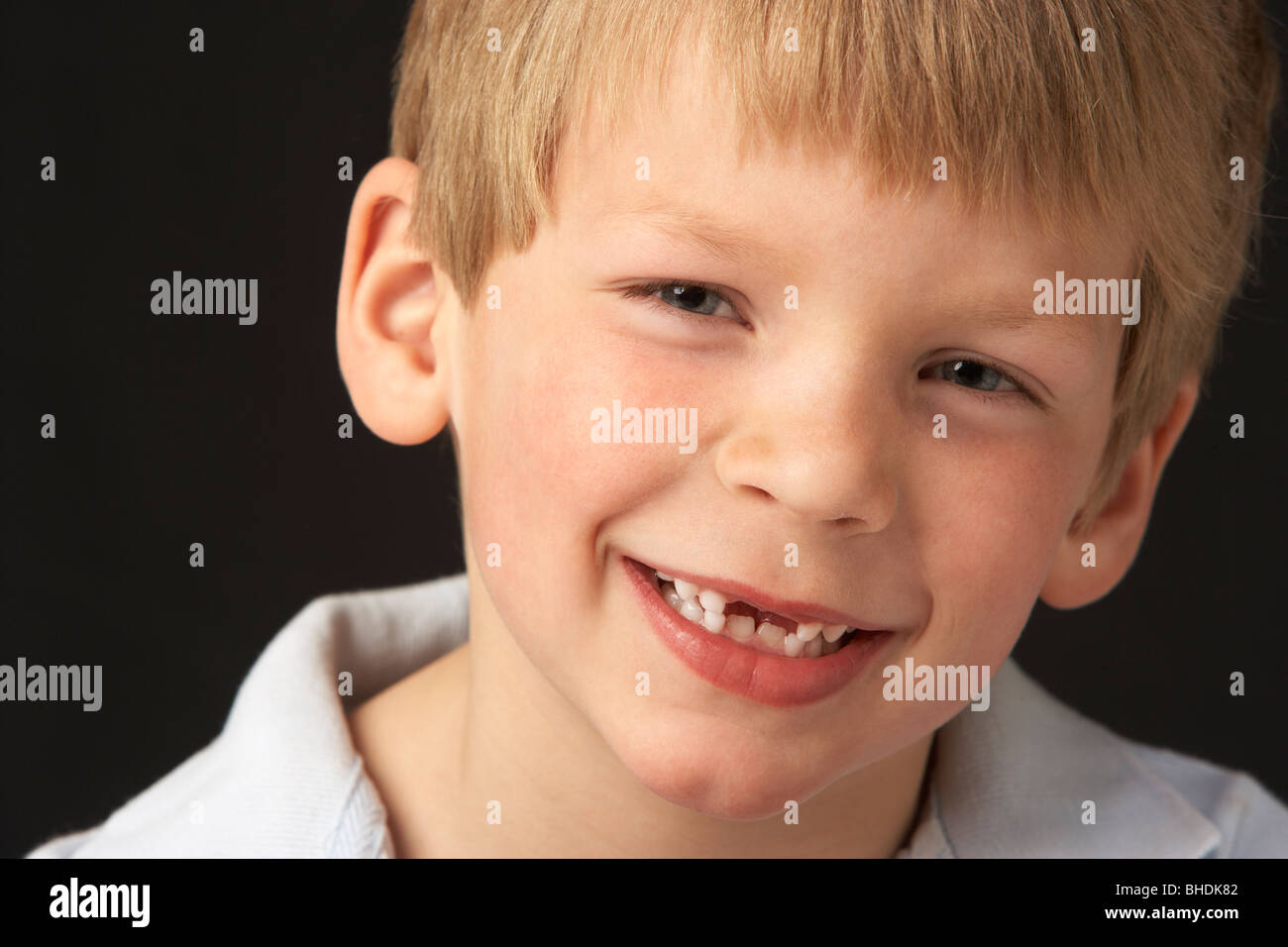 Studio Portrait Of Smiling Boy Stock Photo - Alamy