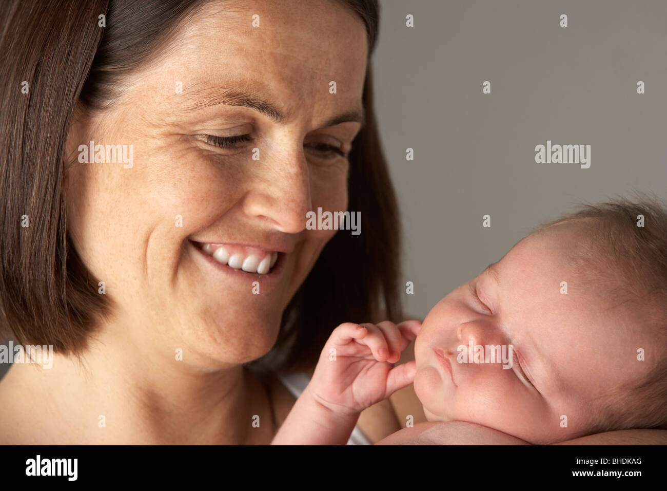 Mother Holding Newborn Baby Stock Photo - Alamy
