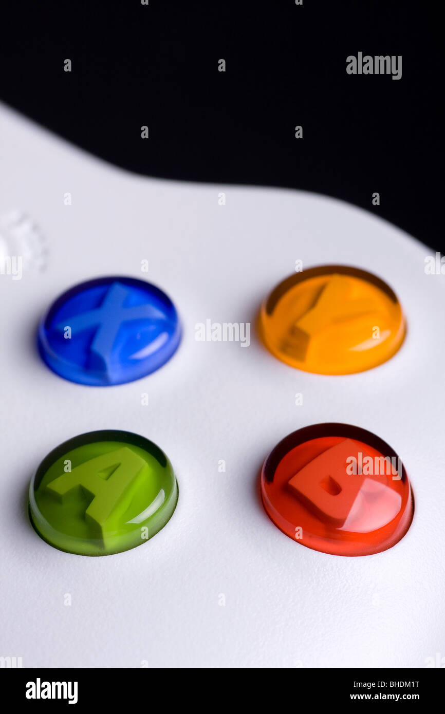 Xbox 360 controller main XYAB button on a black background Stock Photo ...