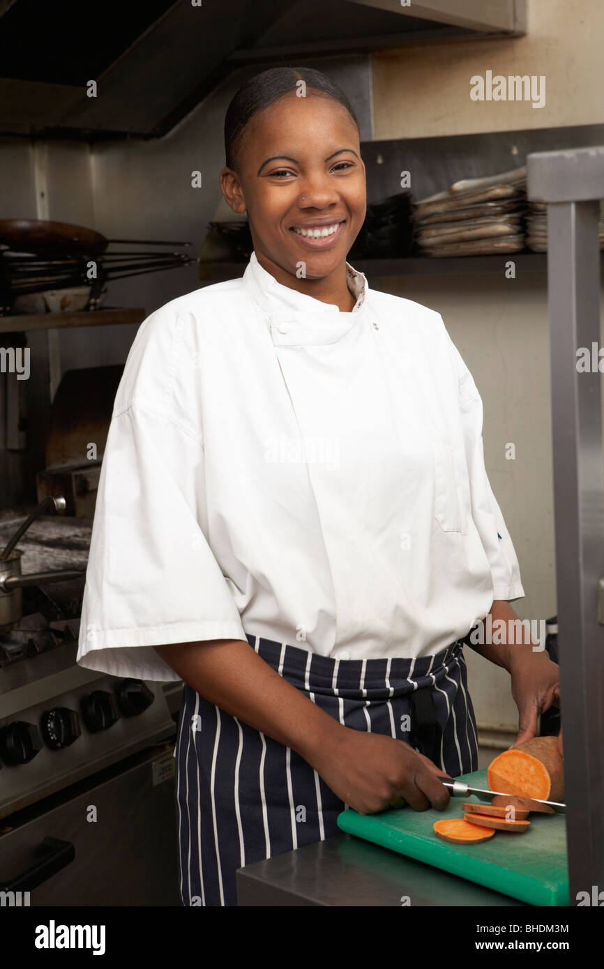 Female Chef Preparing Vegetables In Restaurant Kitchen Stock Photo - Alamy