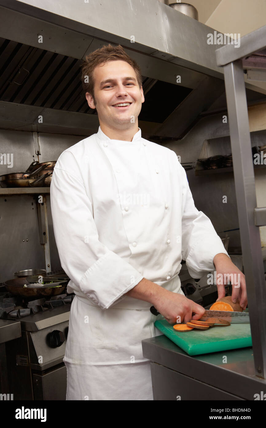 Male Chef Preparing Vegetables In Restaurant Kitchen Stock Photo - Alamy