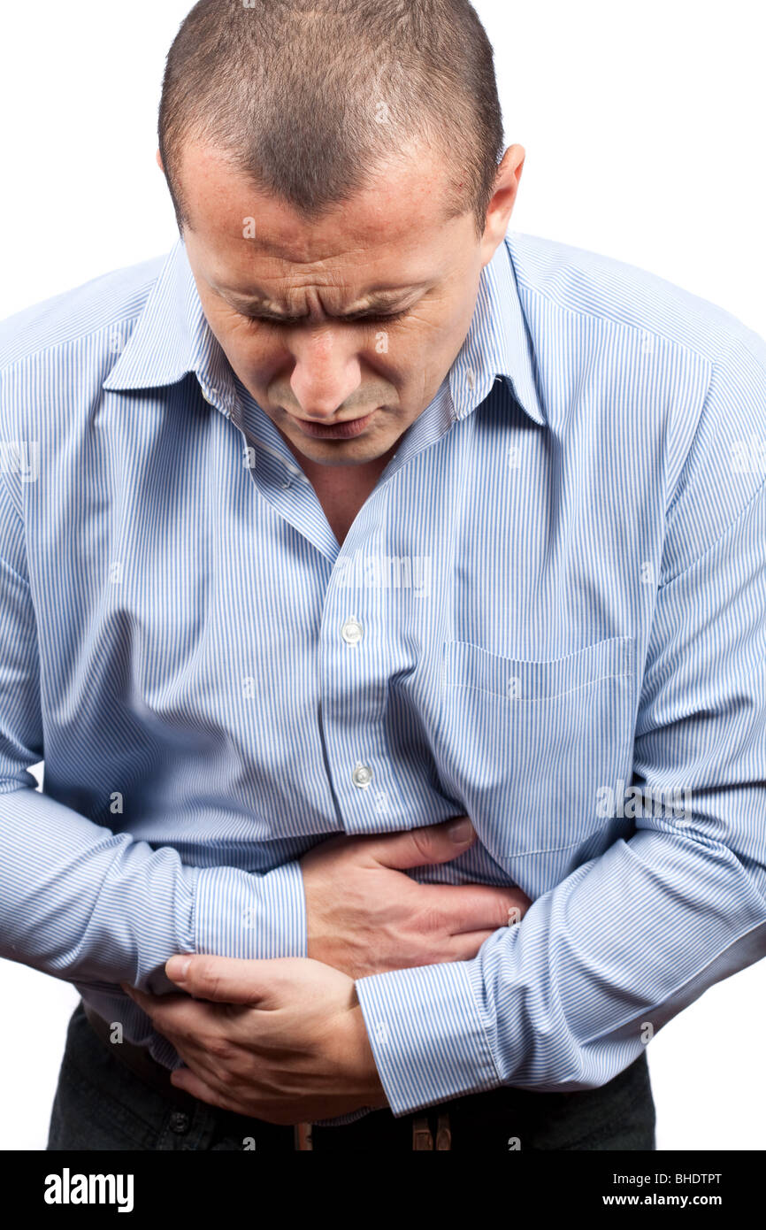 Young man with strong stomach pain isolated on white background Stock ...